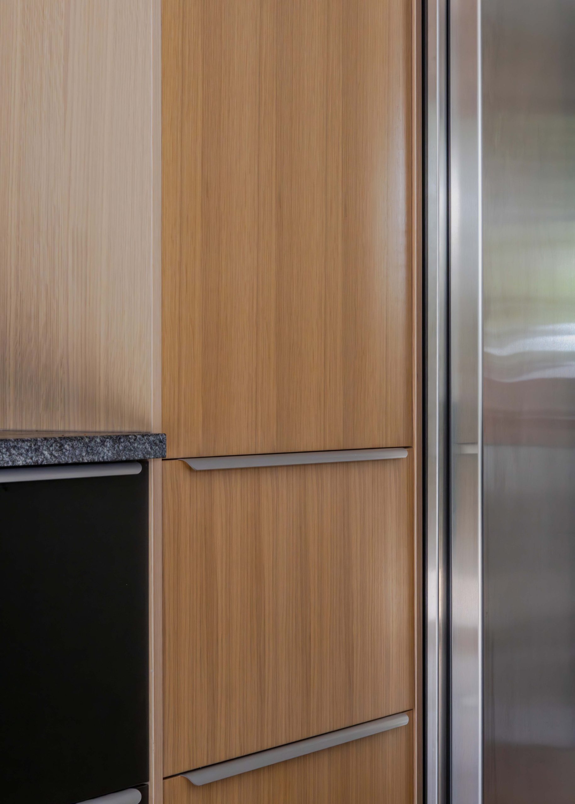 TESS, Rift Cut White Oak Cabinets - Swedish Door